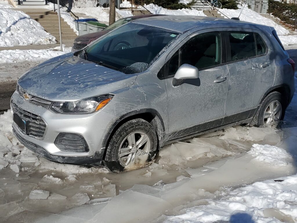 Cars frozen to the ground on Milwaukee's east side - WTMJ